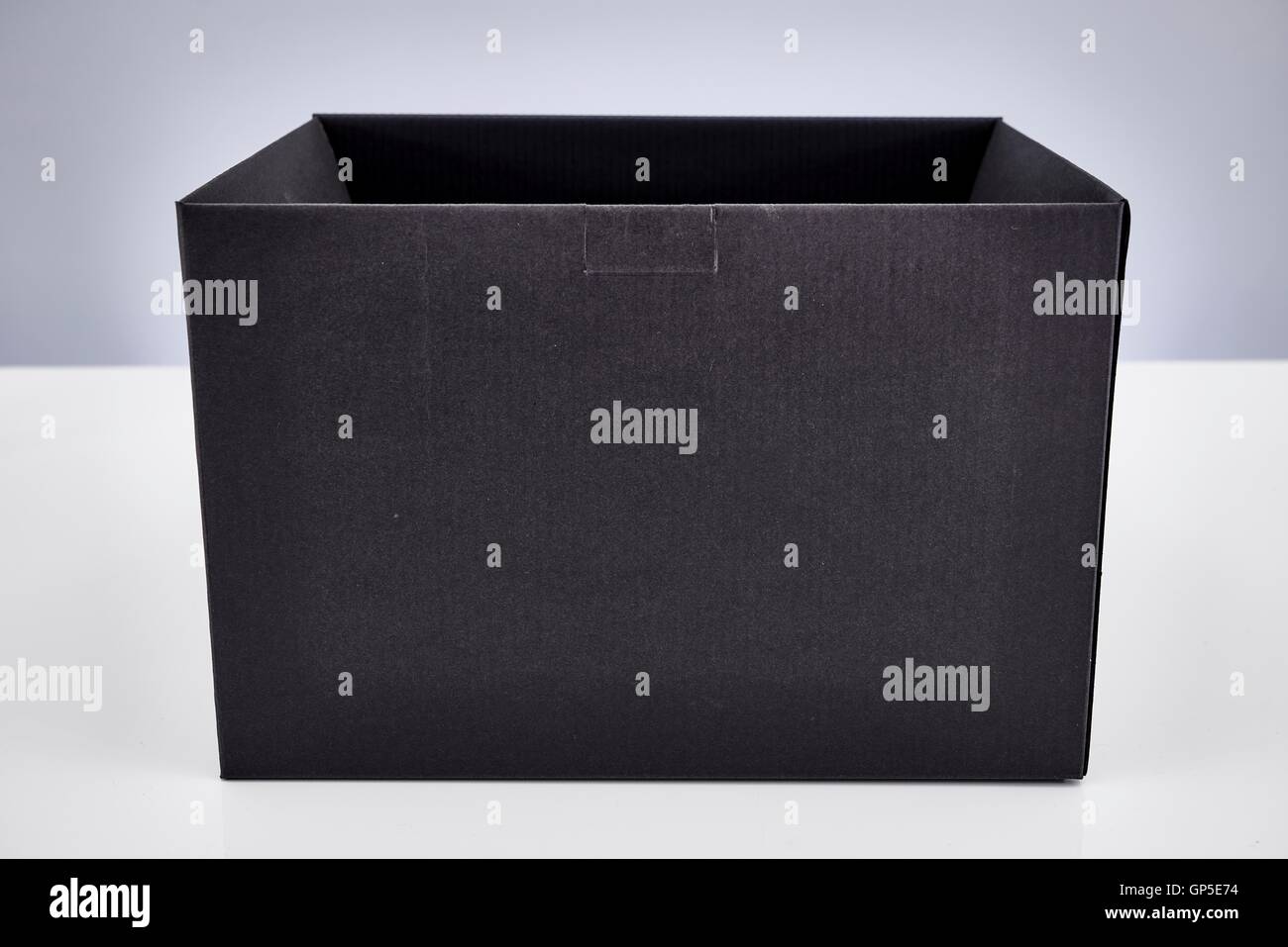 A studio photo of a black box Stock Photo - Alamy