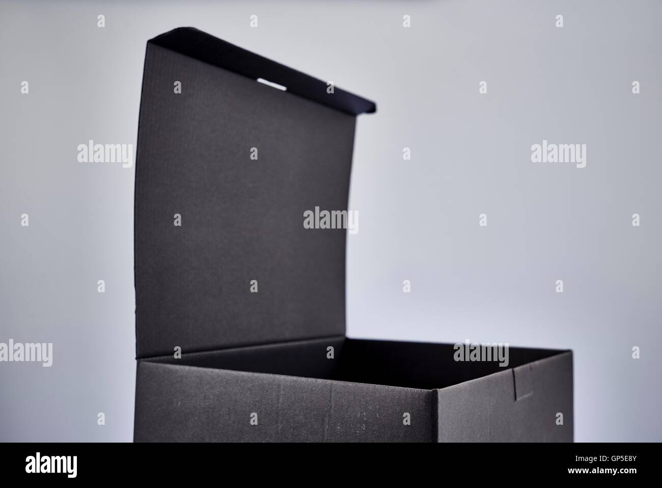 A studio photo of a black box Stock Photo - Alamy