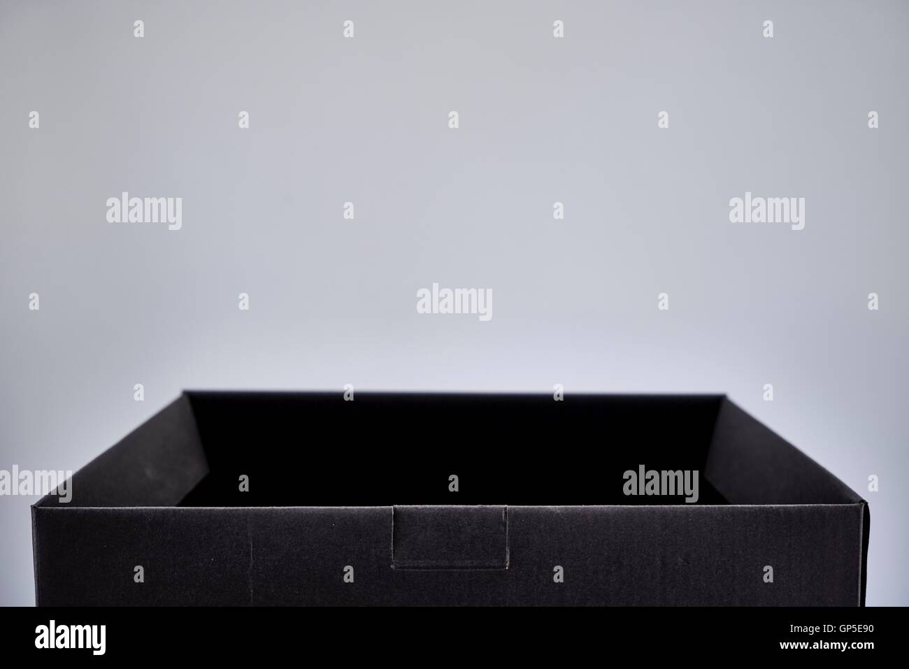 A studio photo of a black box Stock Photo - Alamy