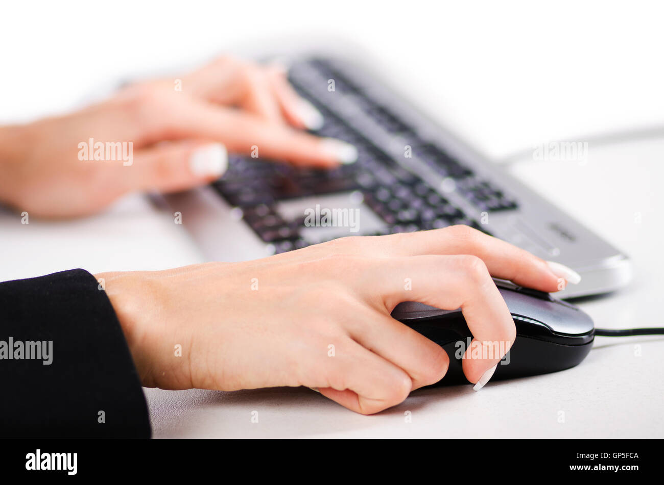 Hands working on the keyboard Stock Photo - Alamy