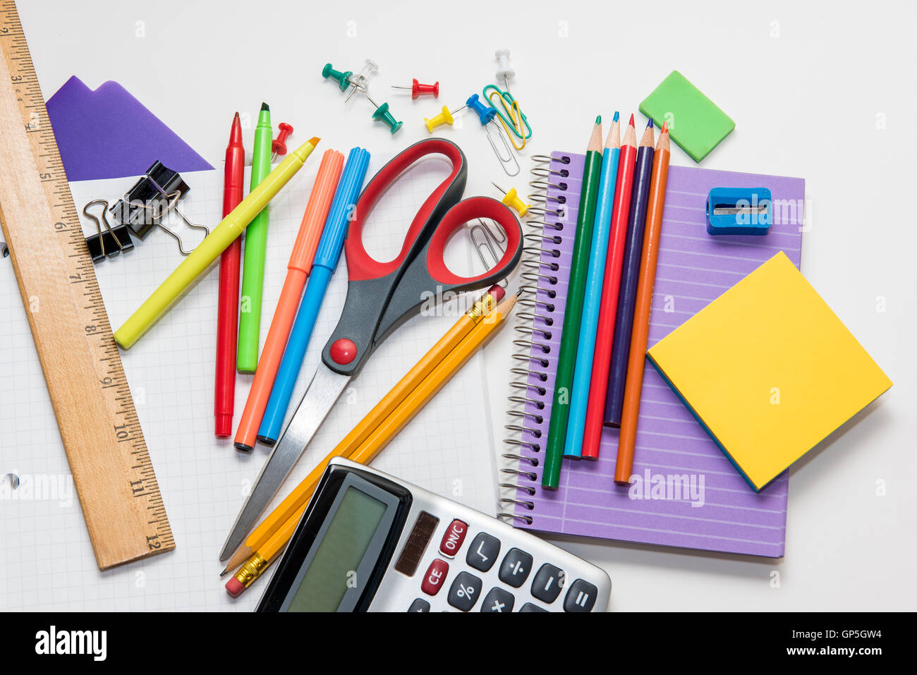 Assortment of school supplies isolated on a white background Stock ...