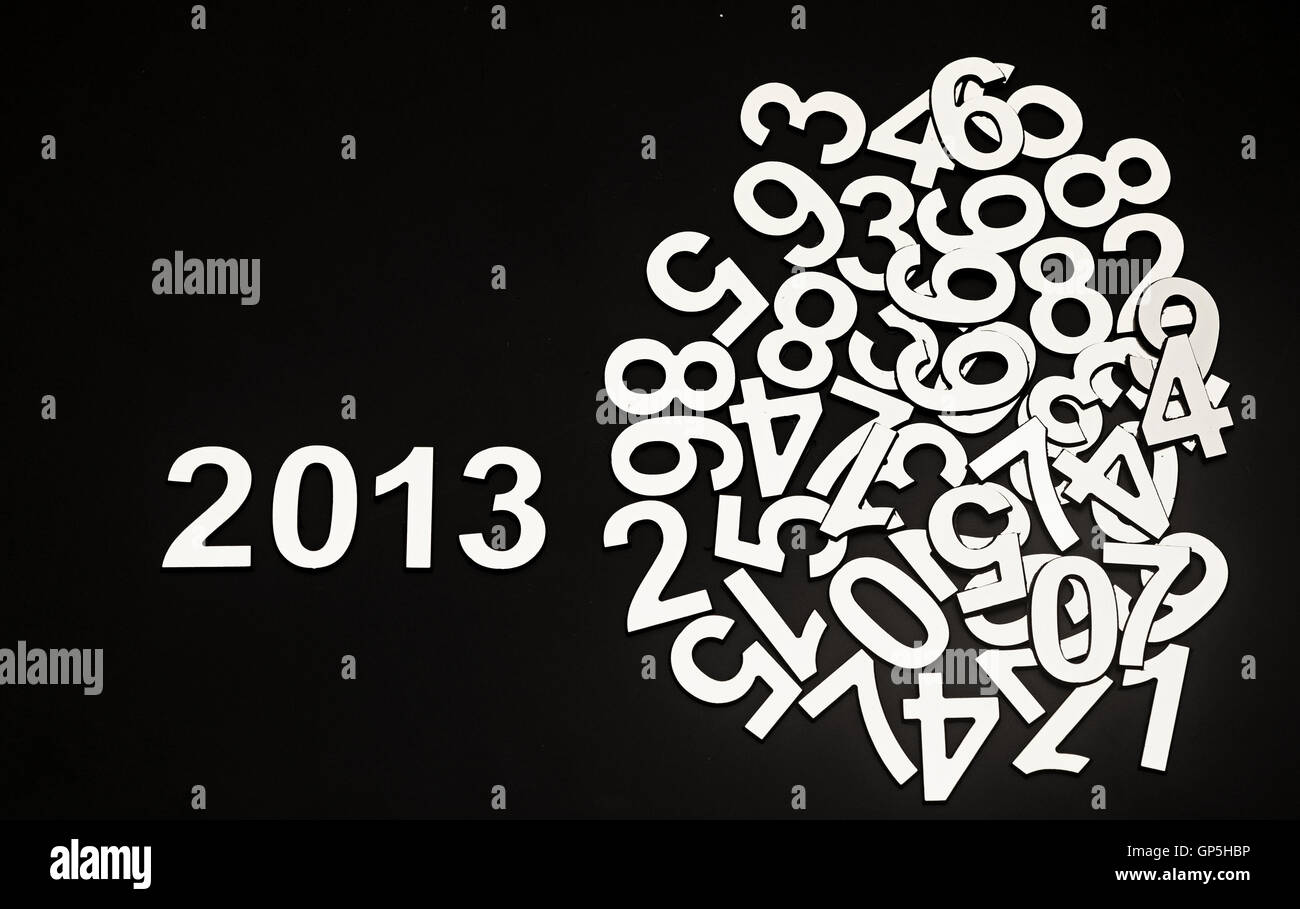 digit 2013 and pile random numbers on black background Stock Photo - Alamy