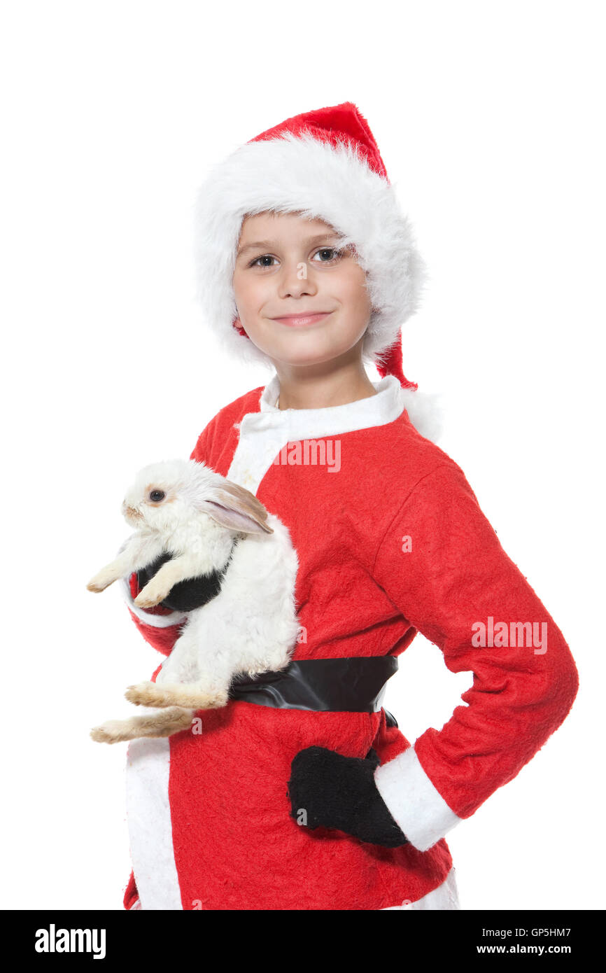 Boy holding a christmas rabbit Stock Photo - Alamy