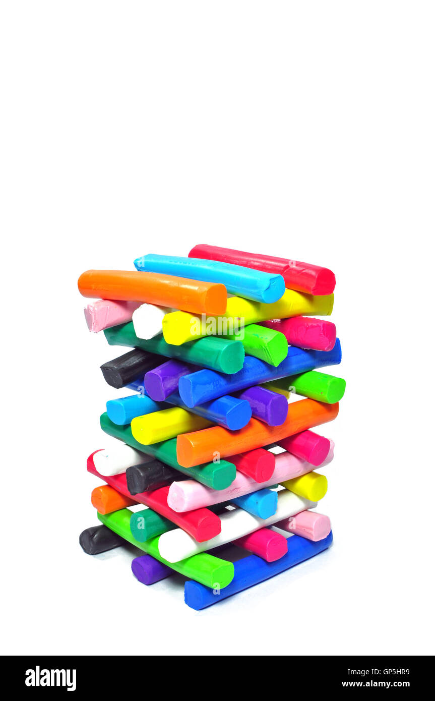 Stack of colorfull plasticine on white background Stock Photo - Alamy