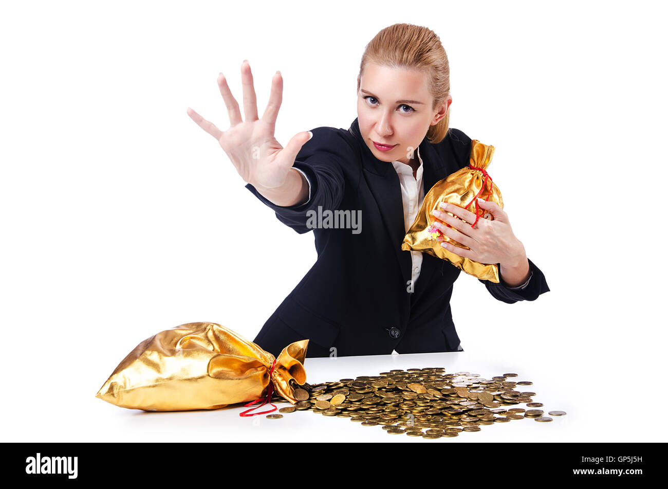 Woman with coins and golden sacks Stock Photo - Alamy