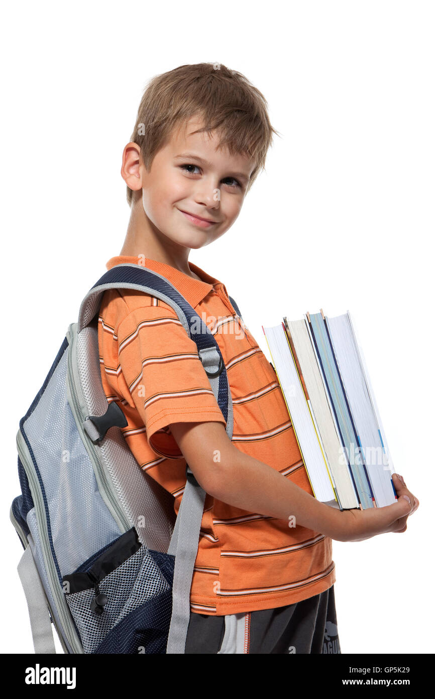 Boy holding books Stock Photo - Alamy