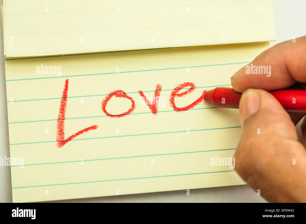 Hand writing love note Stock Photo - Alamy
