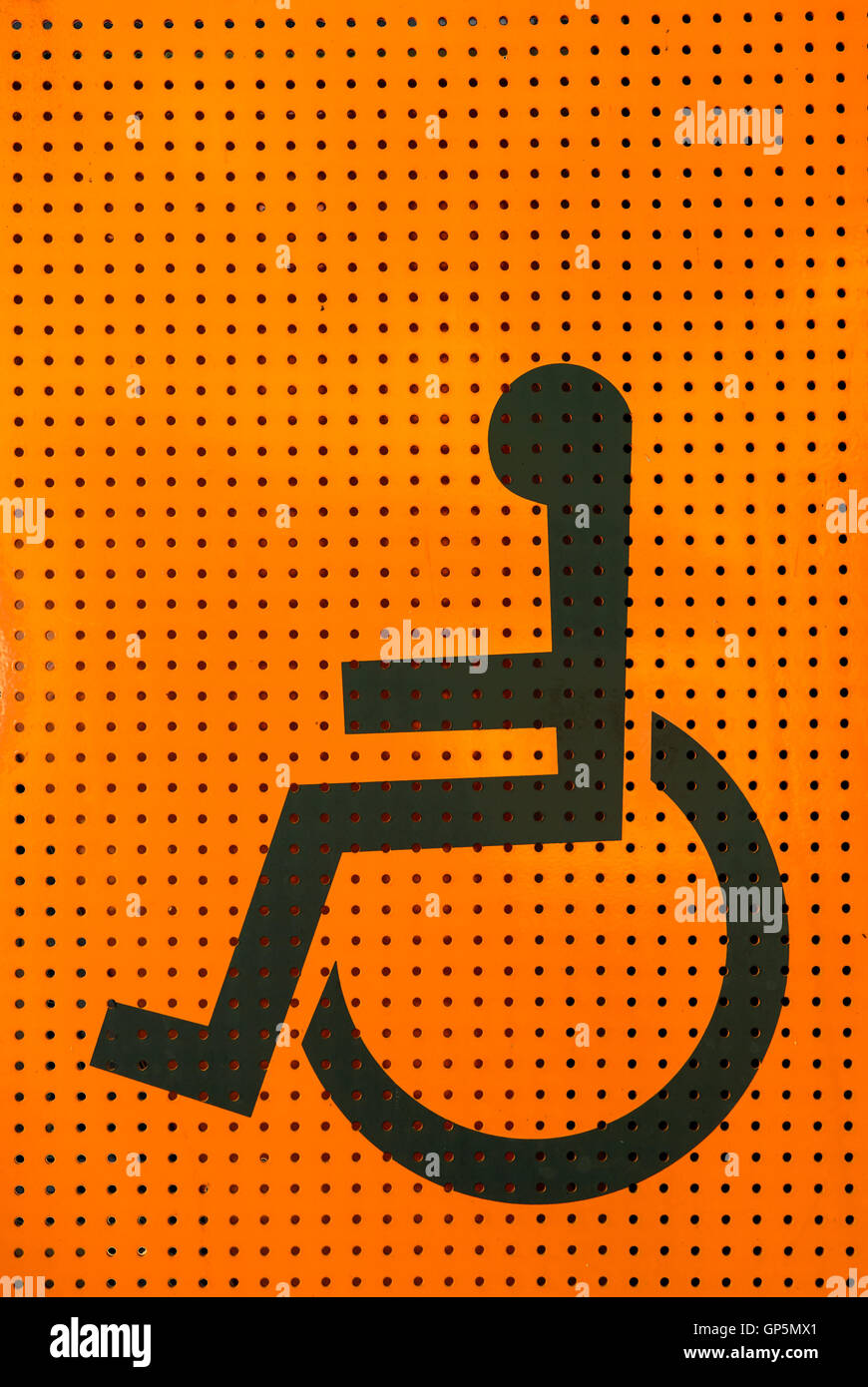 sign disabled icon on orange grating metal Stock Photo - Alamy