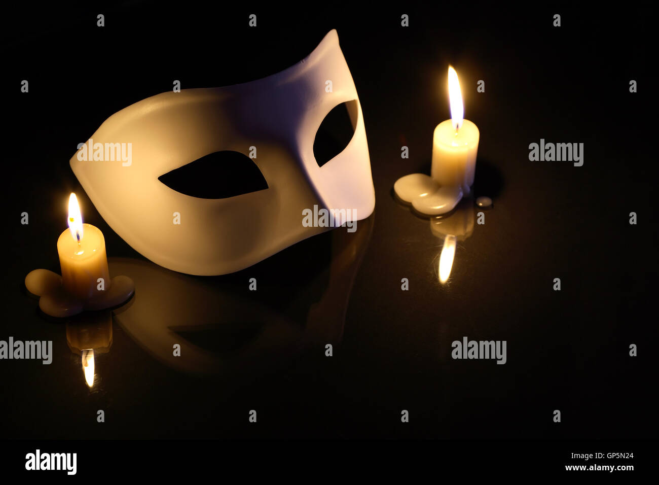 Mask And Candles Stock Photo - Alamy
