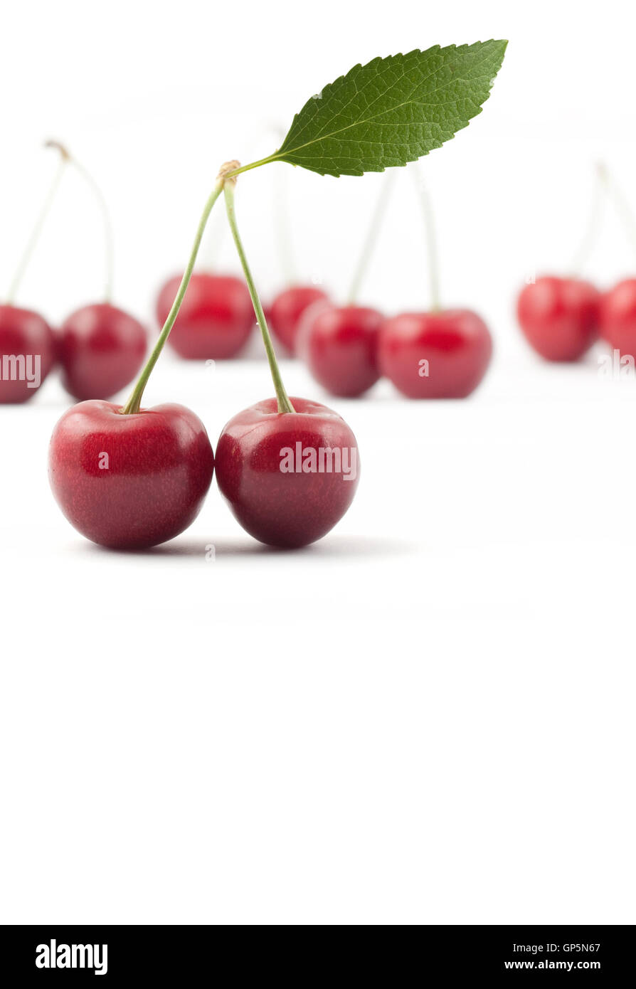 Close up view of two cherries Cut Out Stock Images & Pictures - Alamy
