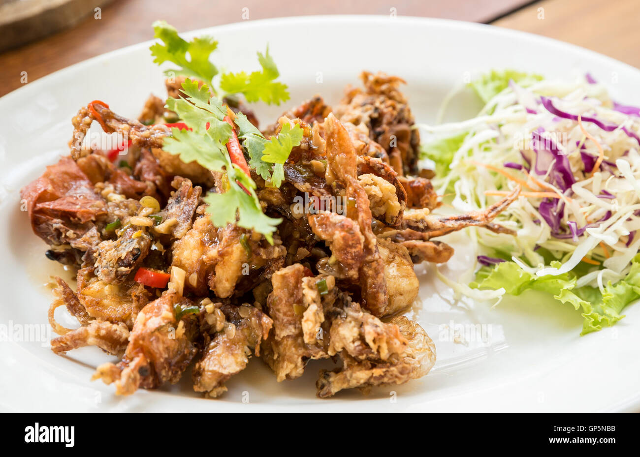 deep fried soft shell crab with black pepper sauce Stock Photo - Alamy