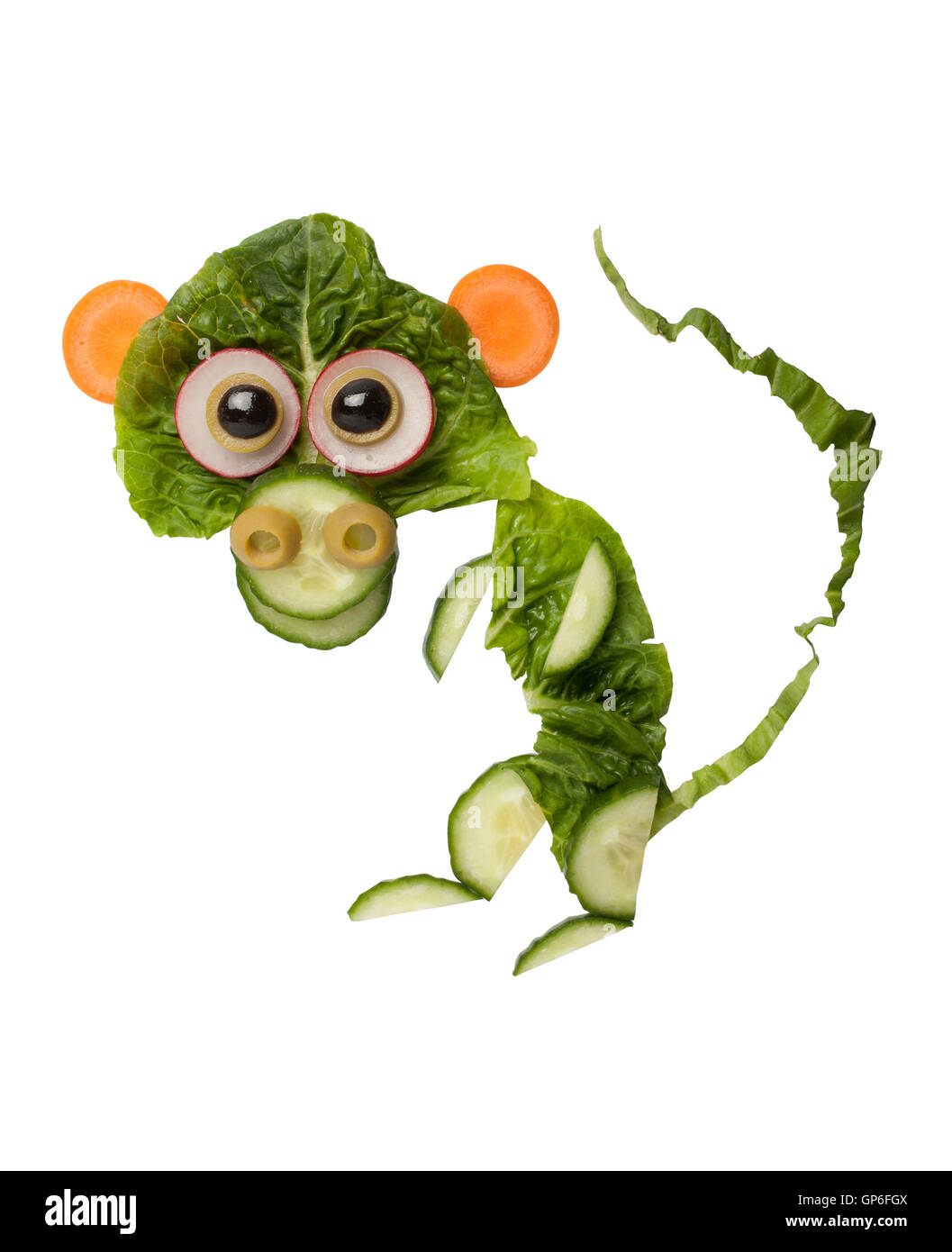 Funny monkey made of salad on isolated background Stock Photo - Alamy