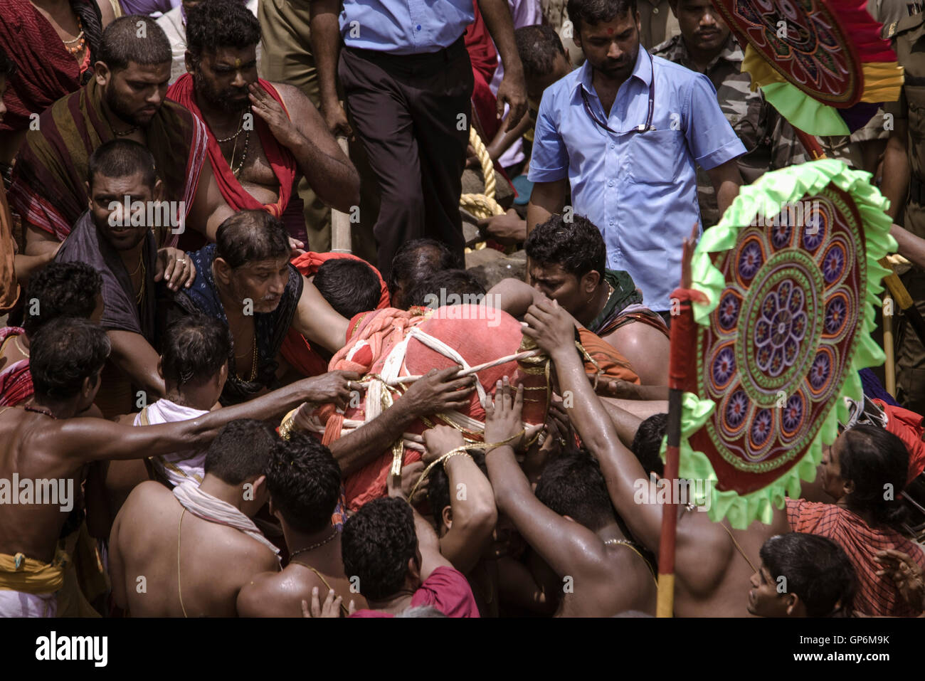 People doing chariot festival ritual, rath yatra, puri, orissa, india ...