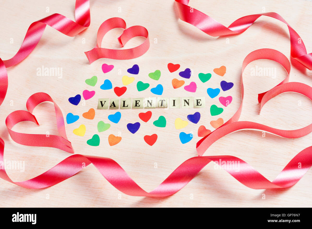 Valentine background written with hearts and ribbon Stock Photo - Alamy