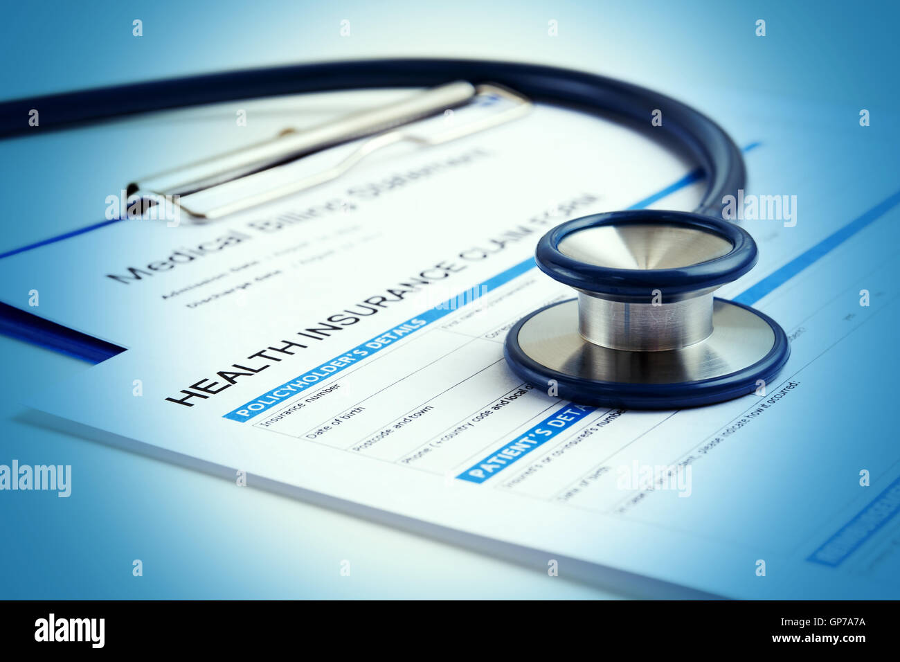 Stethoscope on health insurance form Stock Photo - Alamy