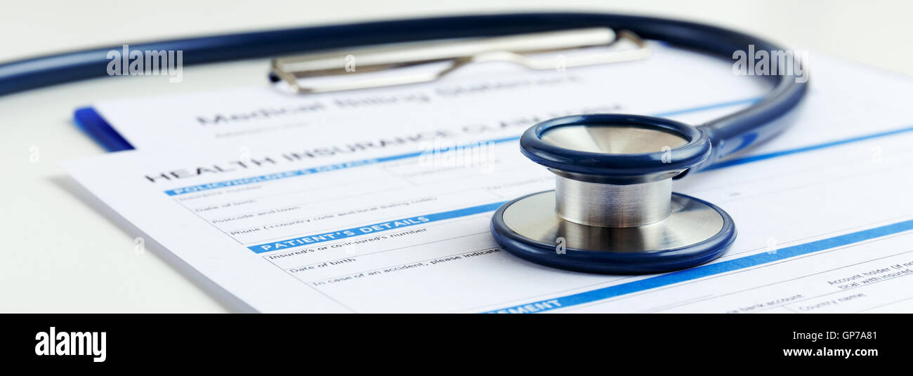 Stethoscope on health insurance form Stock Photo - Alamy