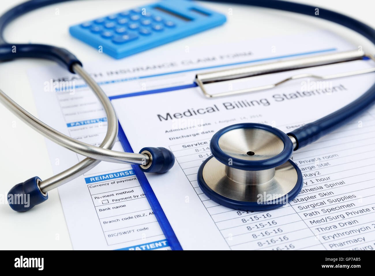 Stethoscope on medical bills and health insurance claim form Stock ...