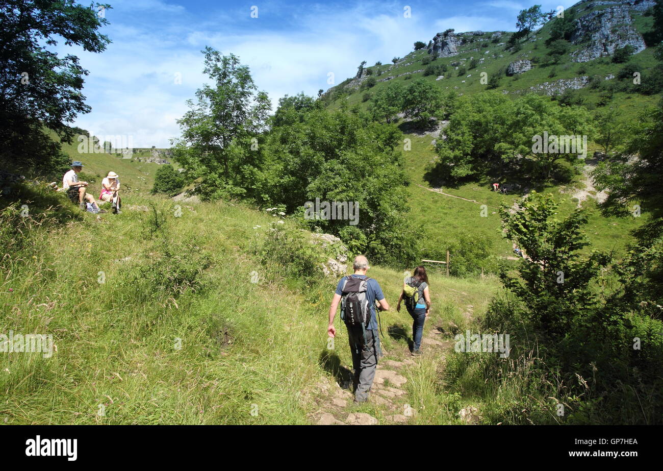 Walkers on a popular route in Lathkill Dale, a scenic limestone gorge ...