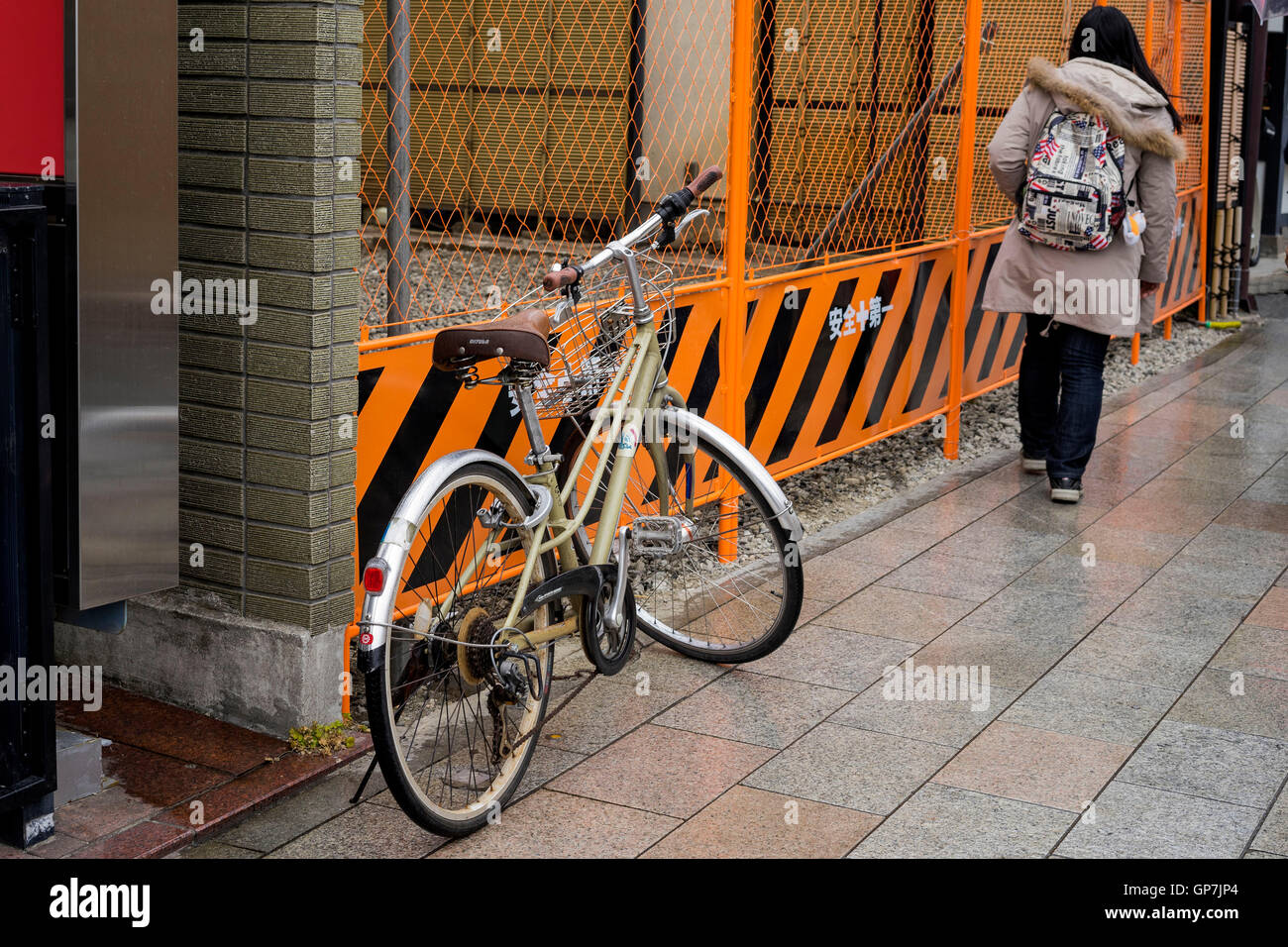 Japanese woman on bicycle hi-res stock photography and images - Alamy