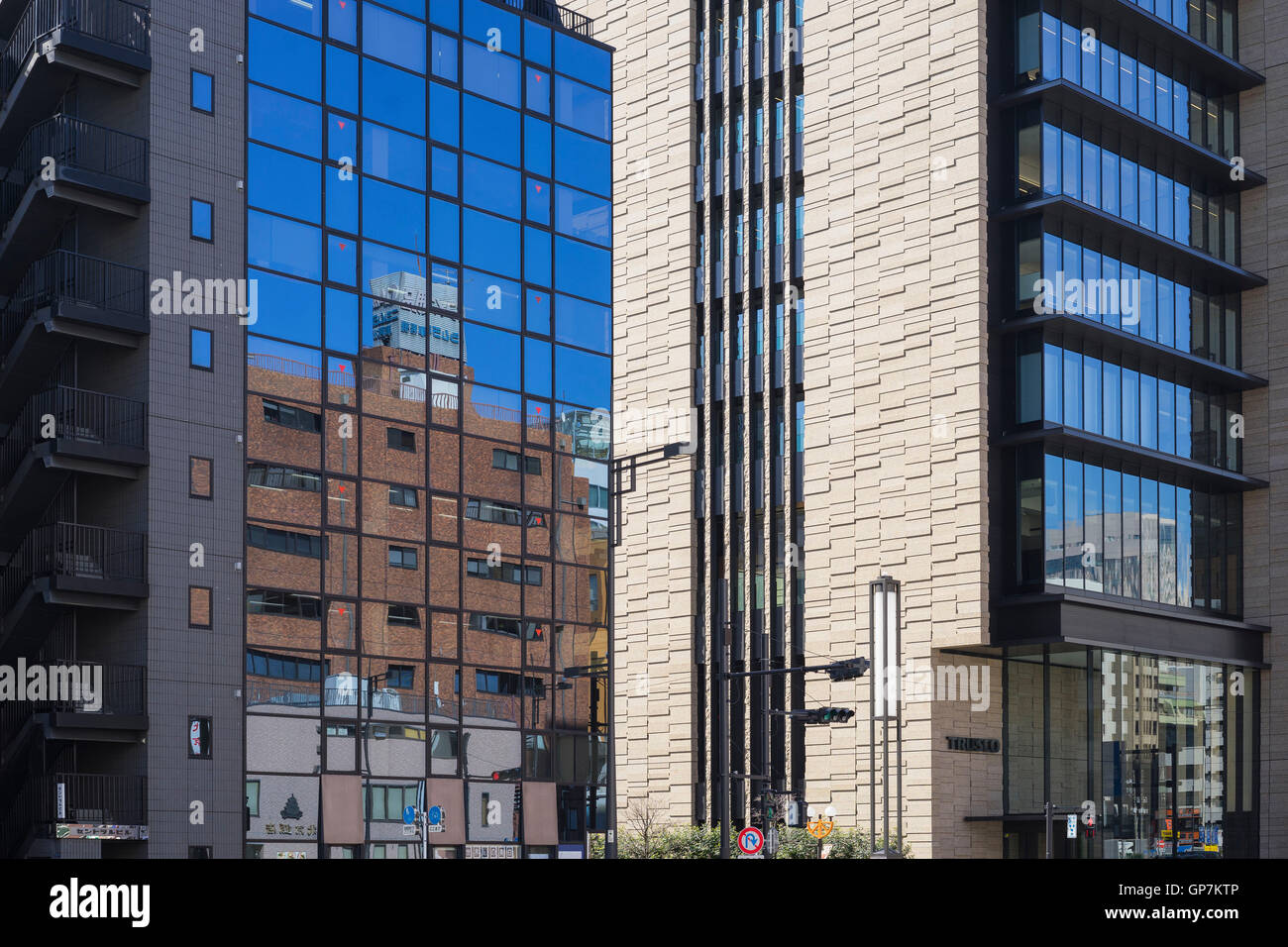 Glass panelled buildings, tokyo, japan Stock Photo - Alamy