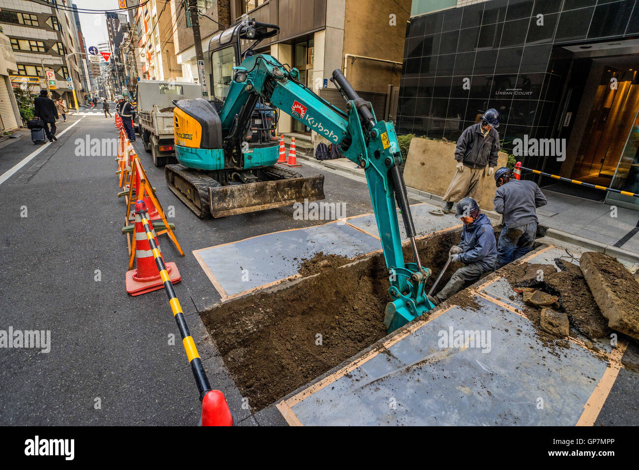 Repair road in tokyo hi-res stock photography and images - Alamy