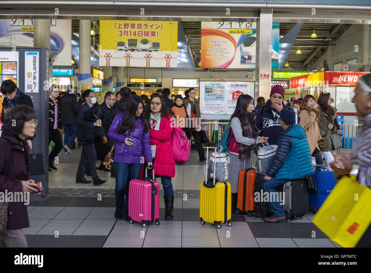 Passenger with luggage, Tokyo, Japan Stock Photo - Alamy