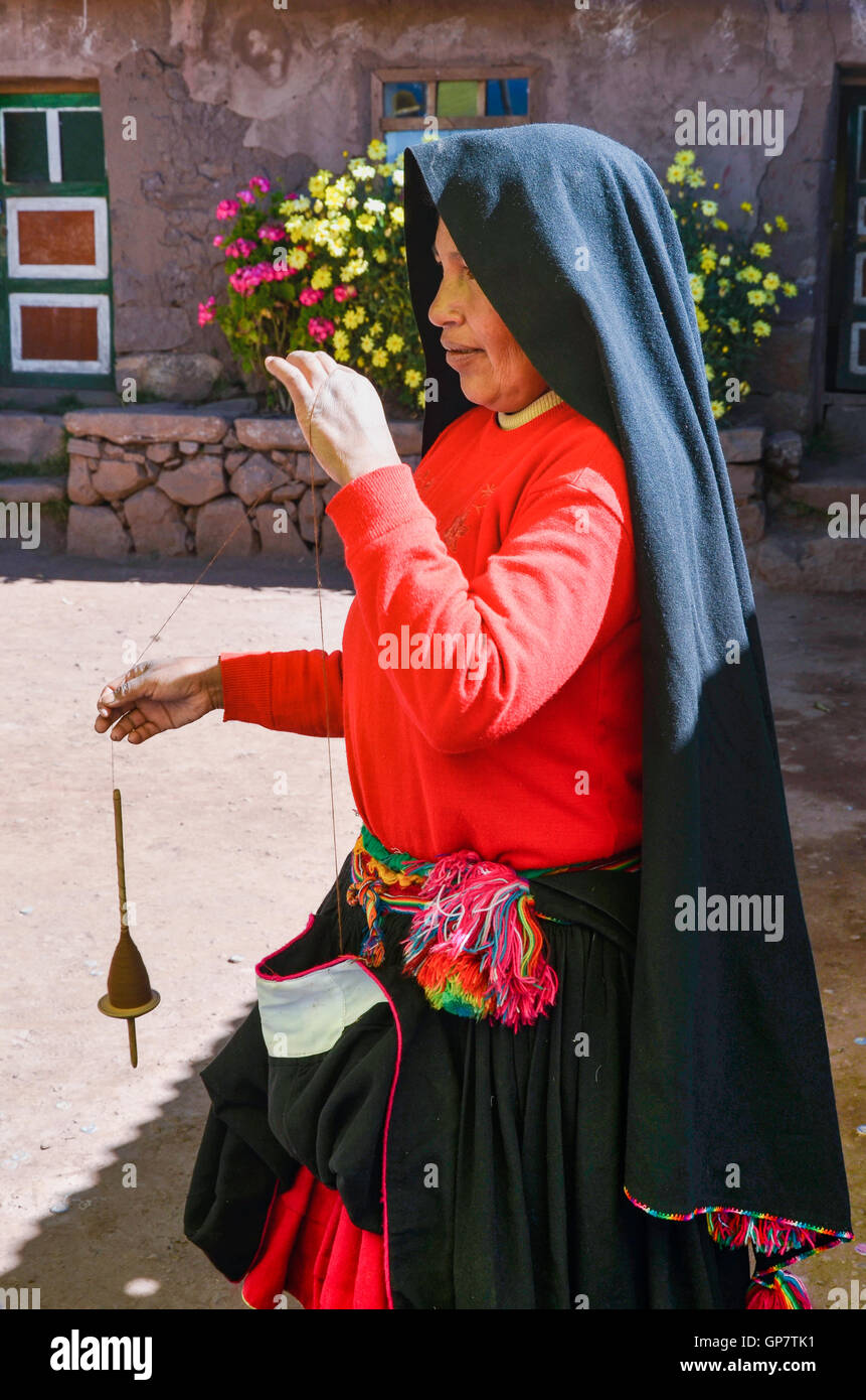 People from Aymara community, in their colourful costumes, are famous ...