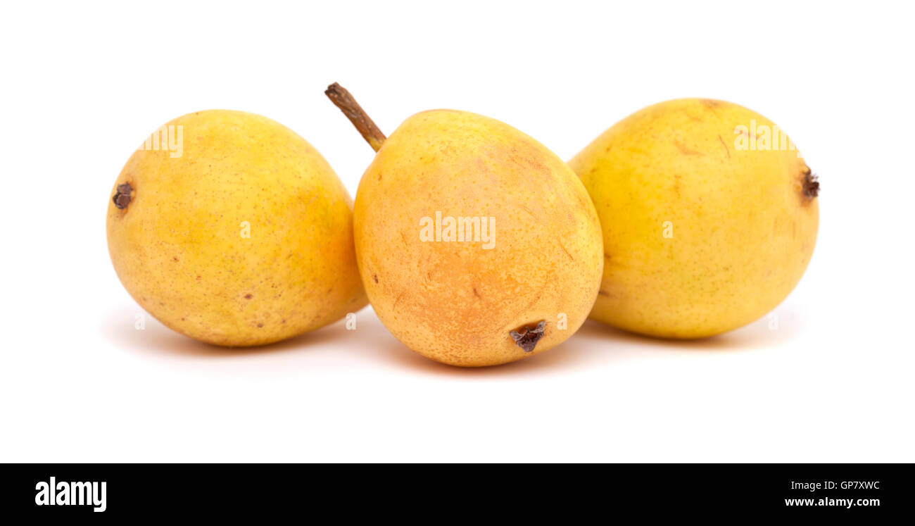 small yellow pears isolated on white background Stock Photo - Alamy
