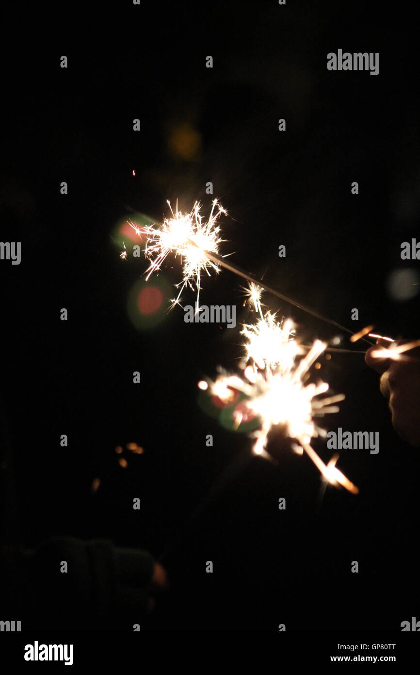 Sparklers on bonfire night Stock Photo - Alamy