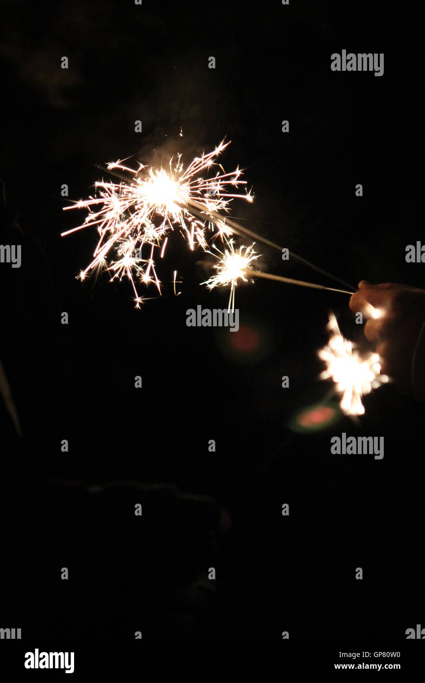 Sparklers on bonfire night Stock Photo - Alamy