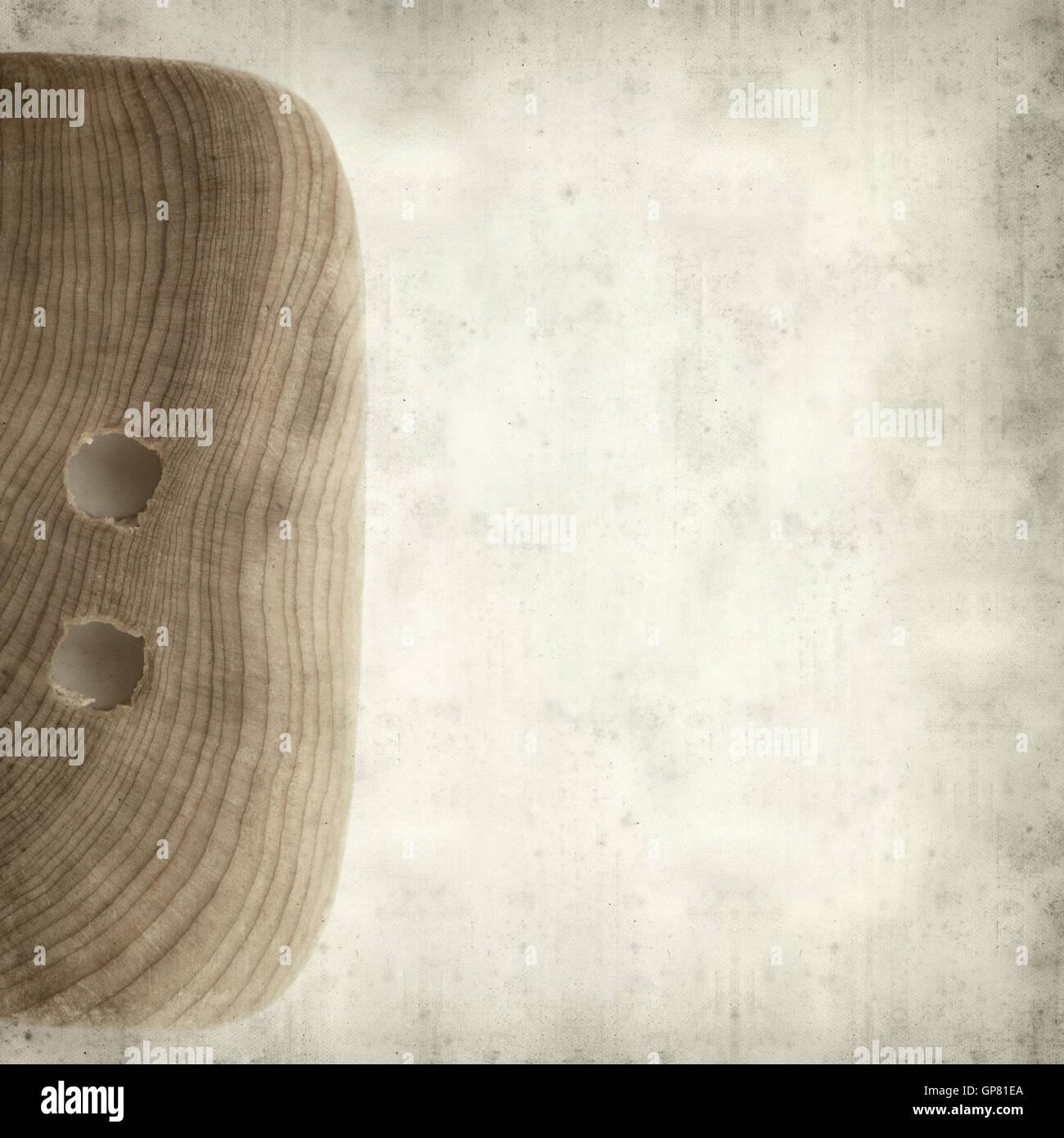 textured old paper background with wooden button Stock Photo - Alamy