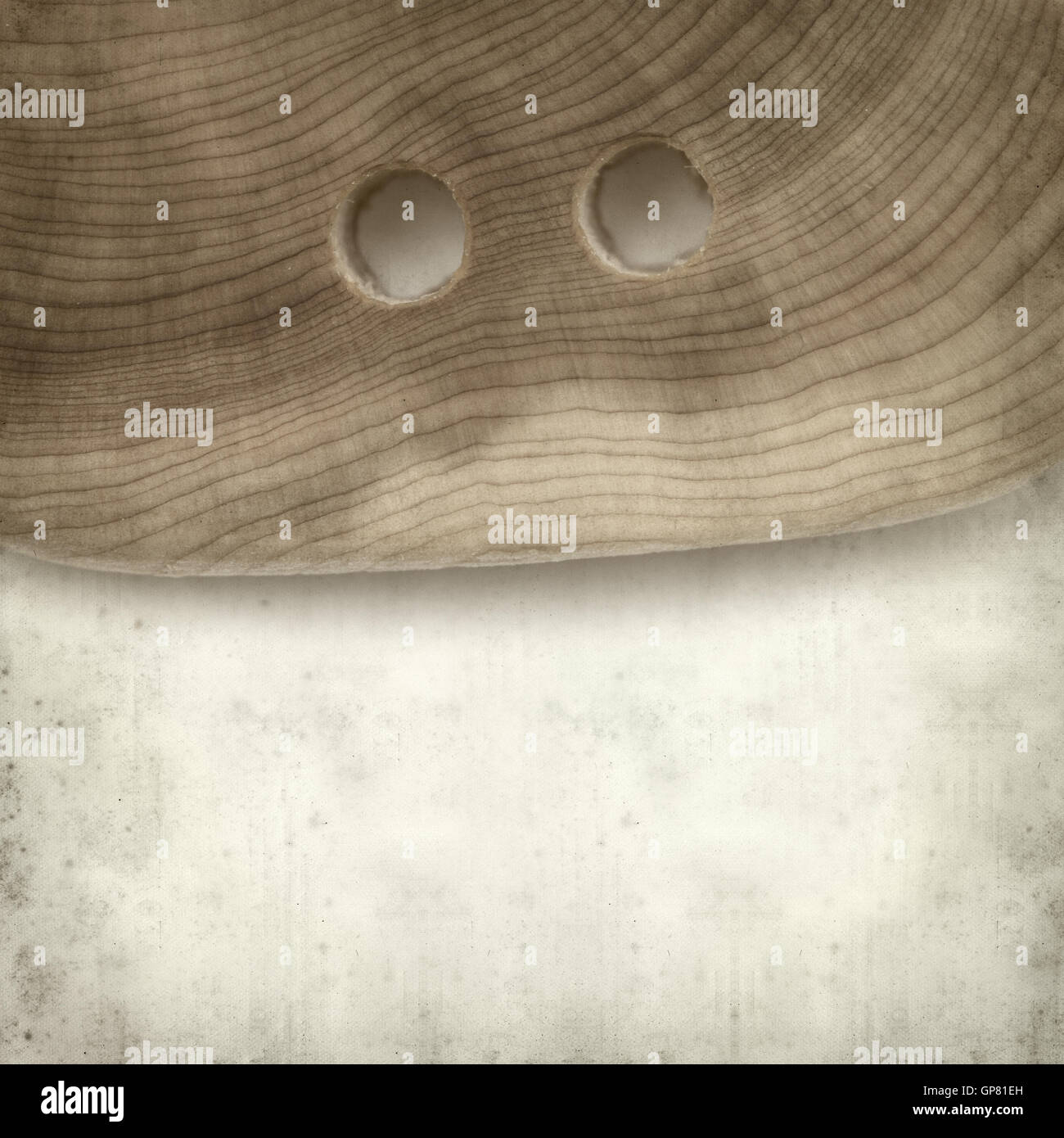 textured old paper background with wooden button Stock Photo - Alamy