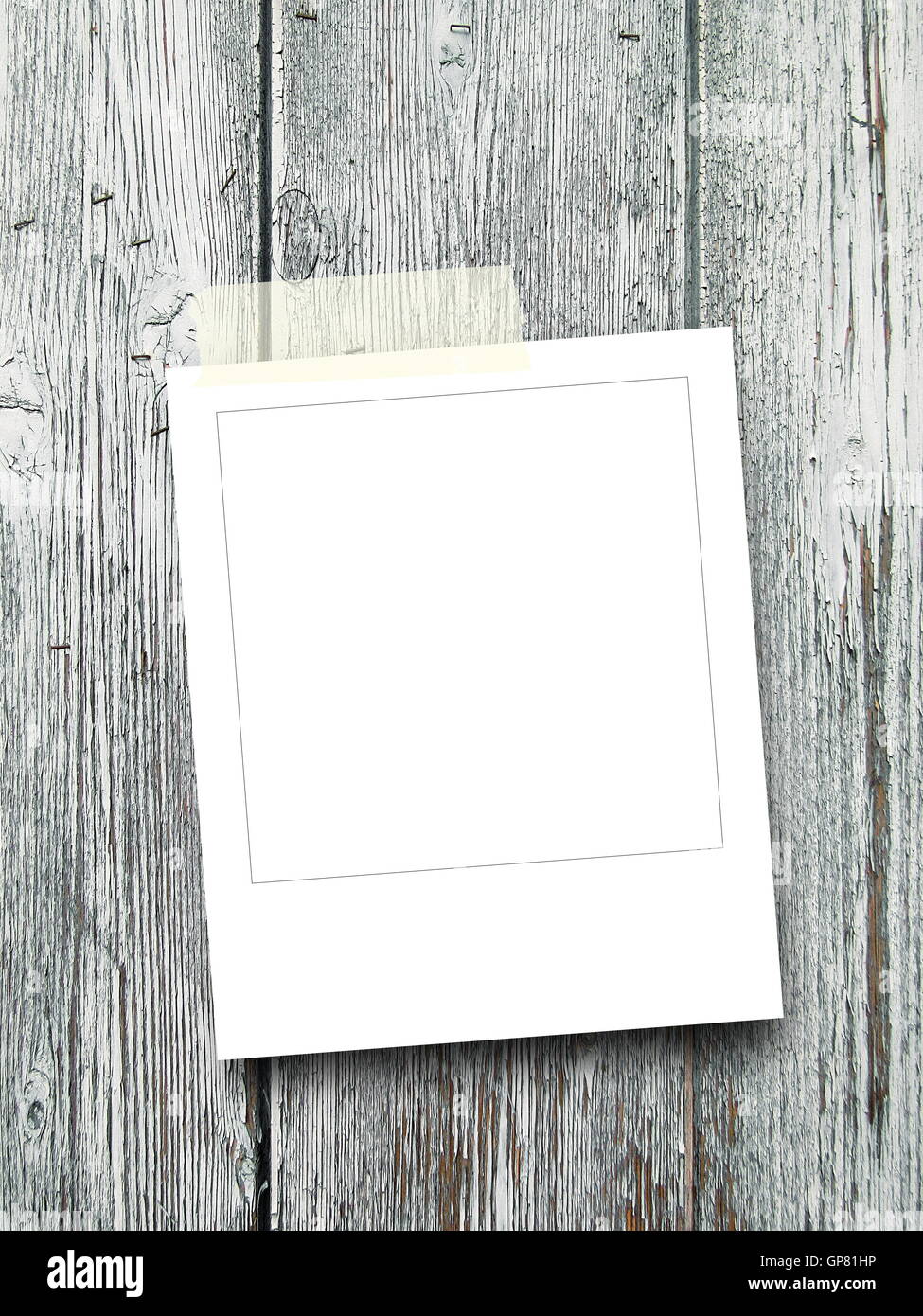 Close-up of one blank square instant photo frames with adhesive tape on ...