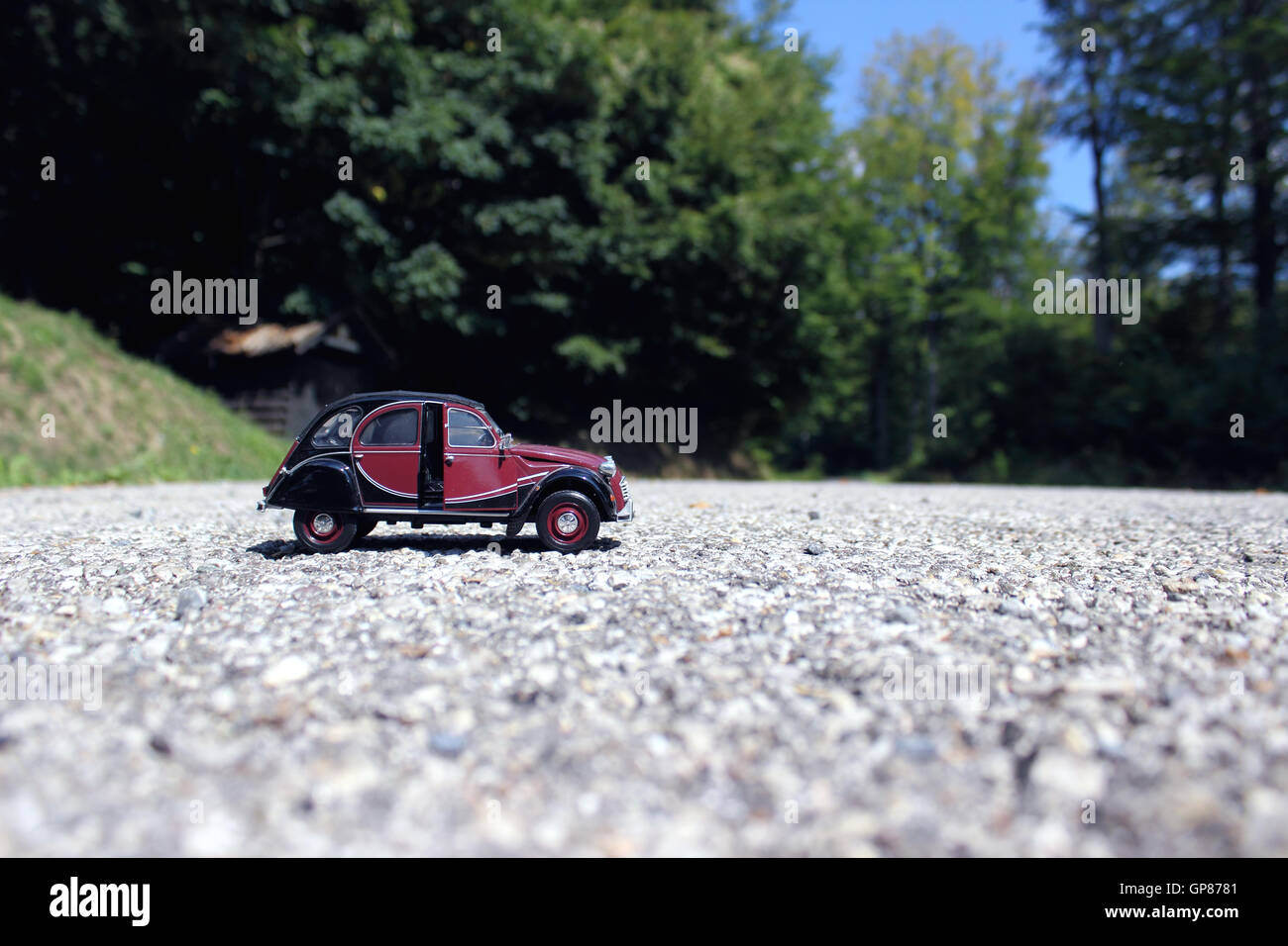 Toy car on road Stock Photo - Alamy