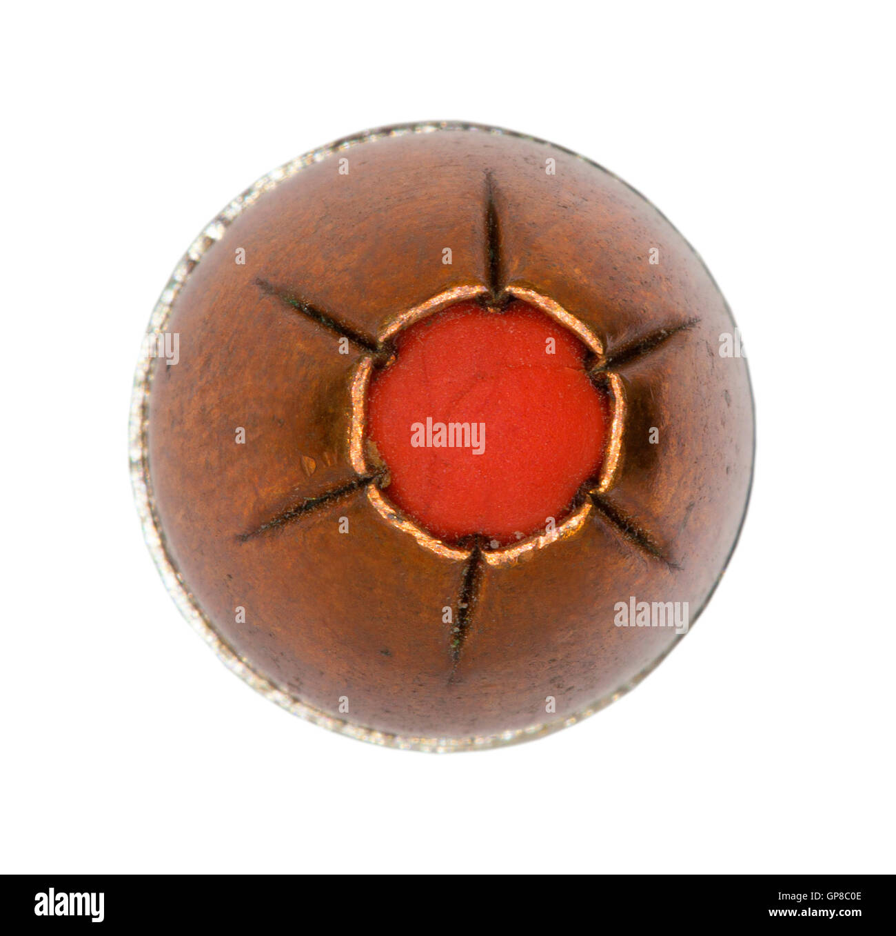 Handgun cartridge that has a hollow point bullet with a red center ...