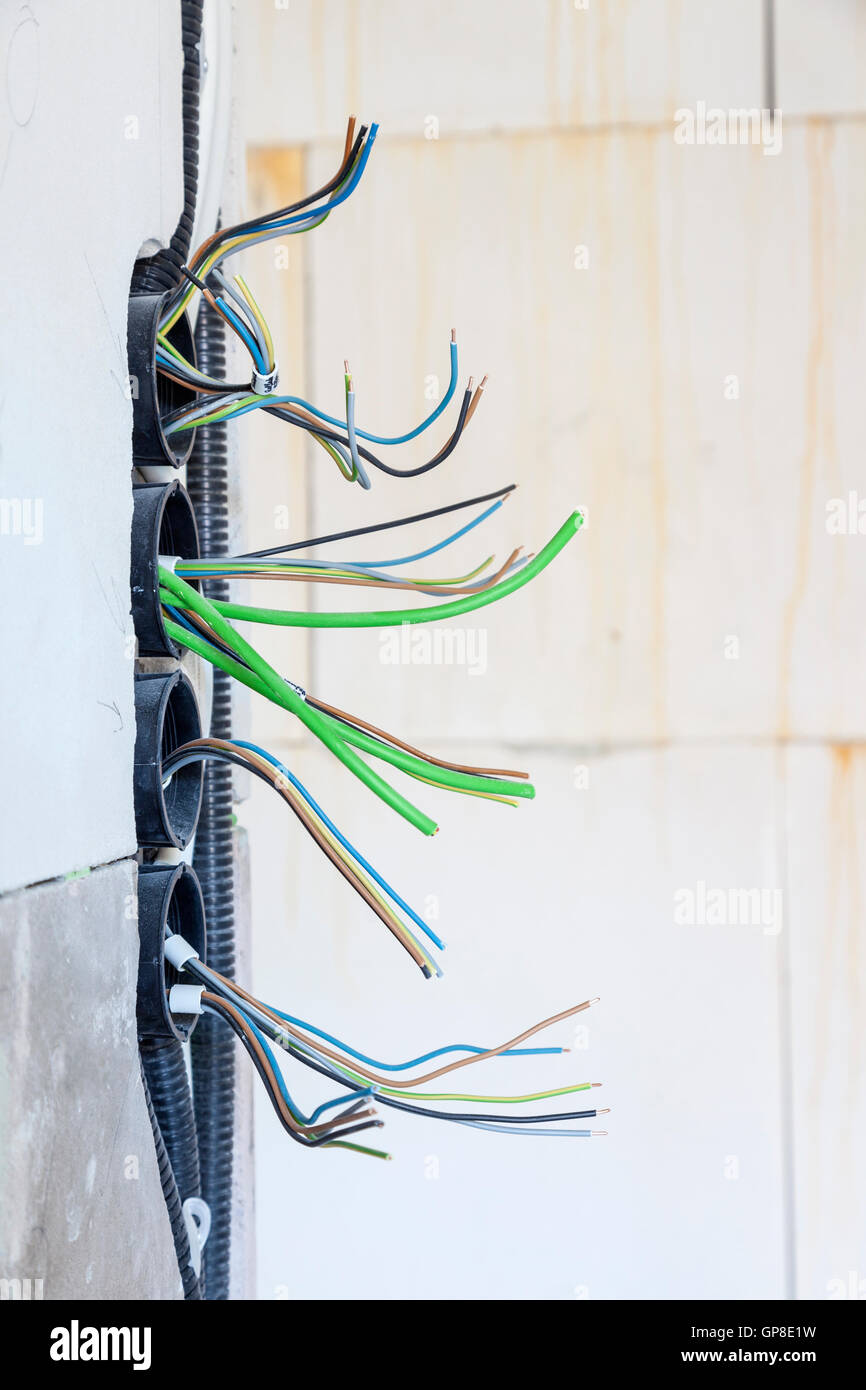 Cables and pipes in the wall Stock Photo - Alamy