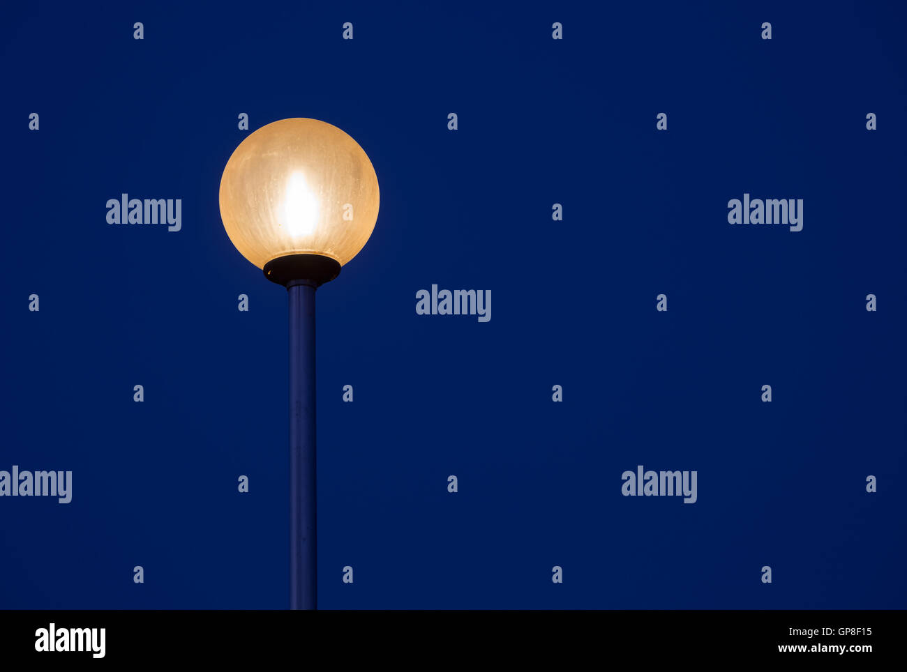 Round streetlight on dark blue sky Stock Photo - Alamy