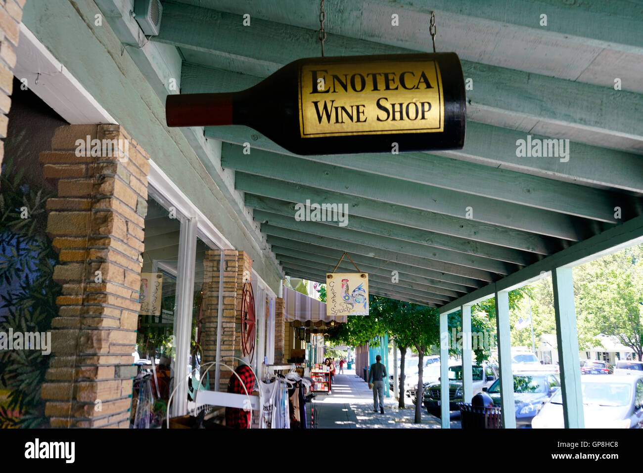 A wine bottle shaped sign of a local wine shop.Calistoga,California,USA ...