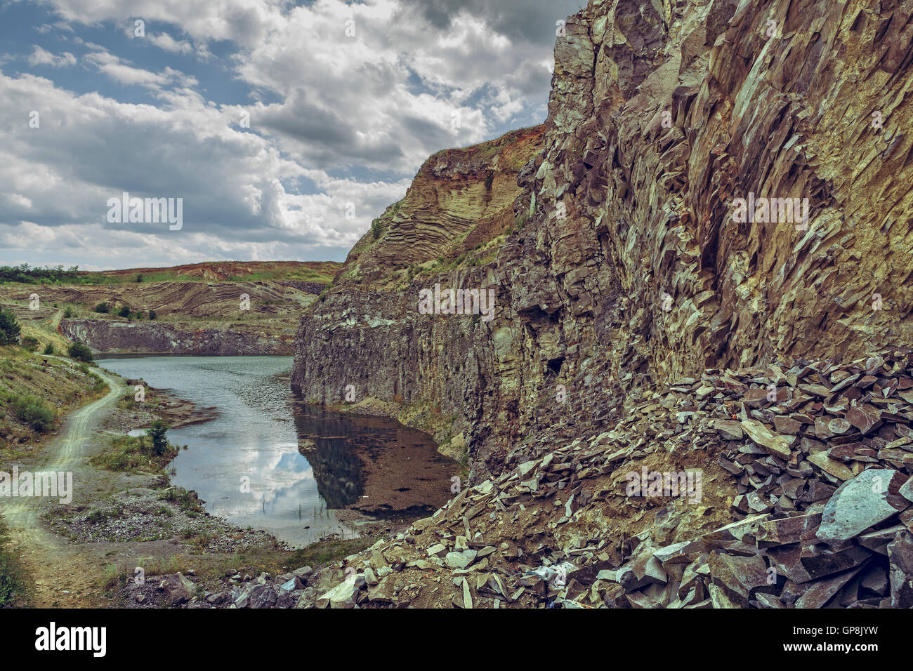 Scenic view of a lake formed in a former basalt quarry near the Racos ...