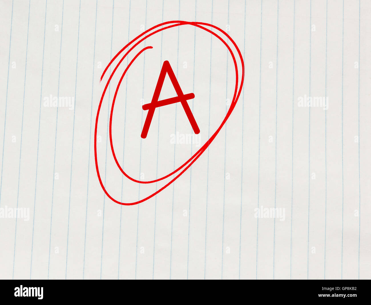 Grade A written in red on notebook paper Stock Photo - Alamy