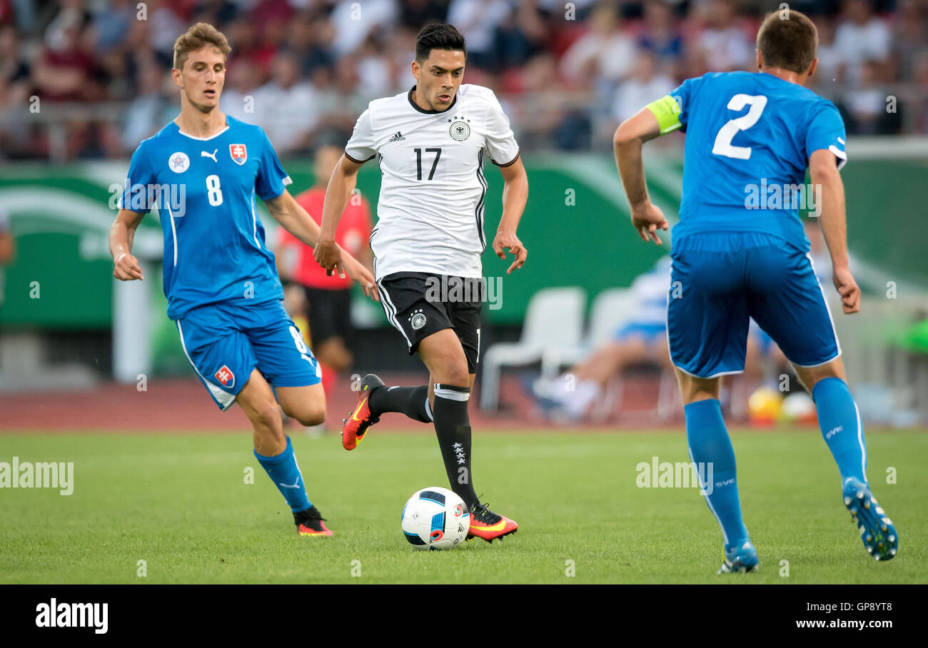 Germany's Nadiem Amiri and Slovakia's Martin Chrien compete for the ...