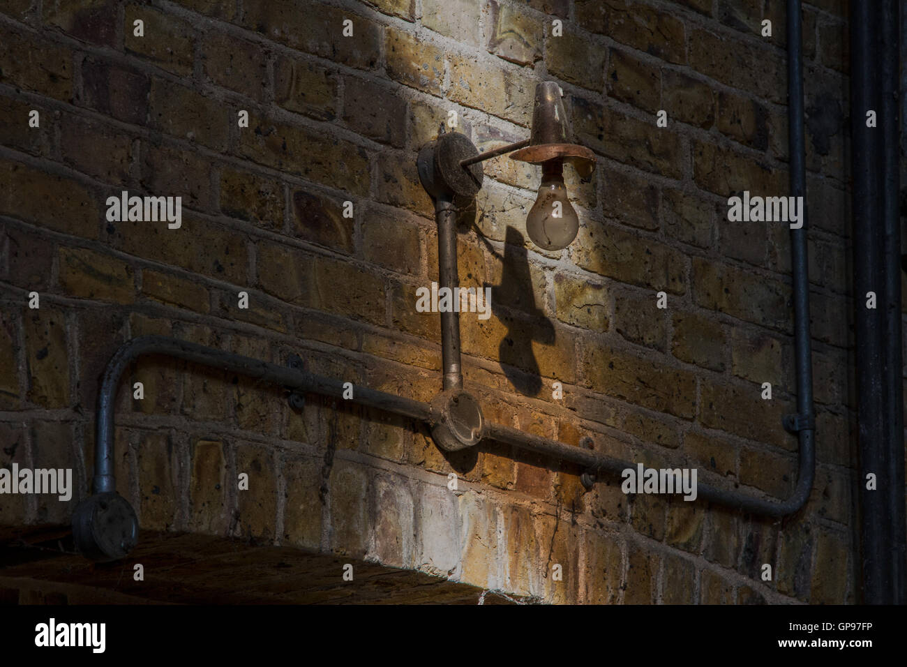 Old light fitting illuminated by the sunlight inside Severalls Chapel ...