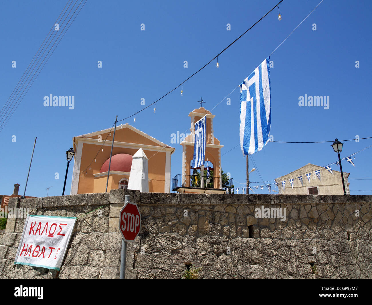Greek flags flying near Xanthates Church, Corfu, Greece before annual ...
