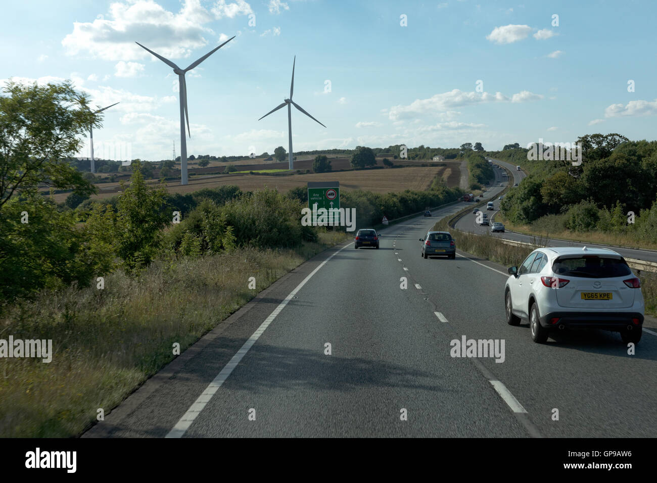 Driving through wind farm turbines hi-res stock photography and images ...