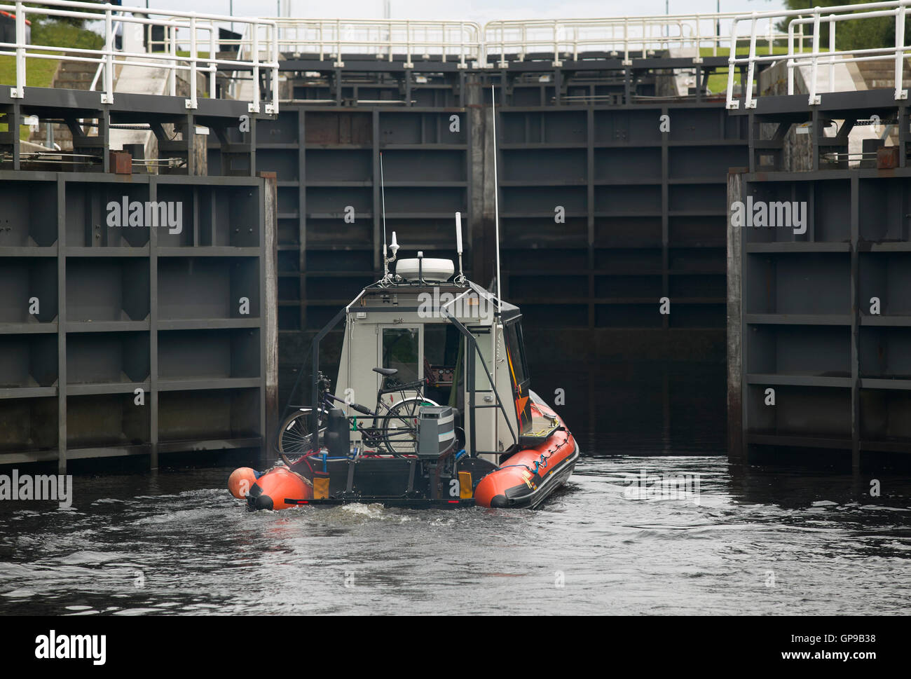 Caledonian canal with boat and lock in Scotland. Horizontal Stock Photo ...