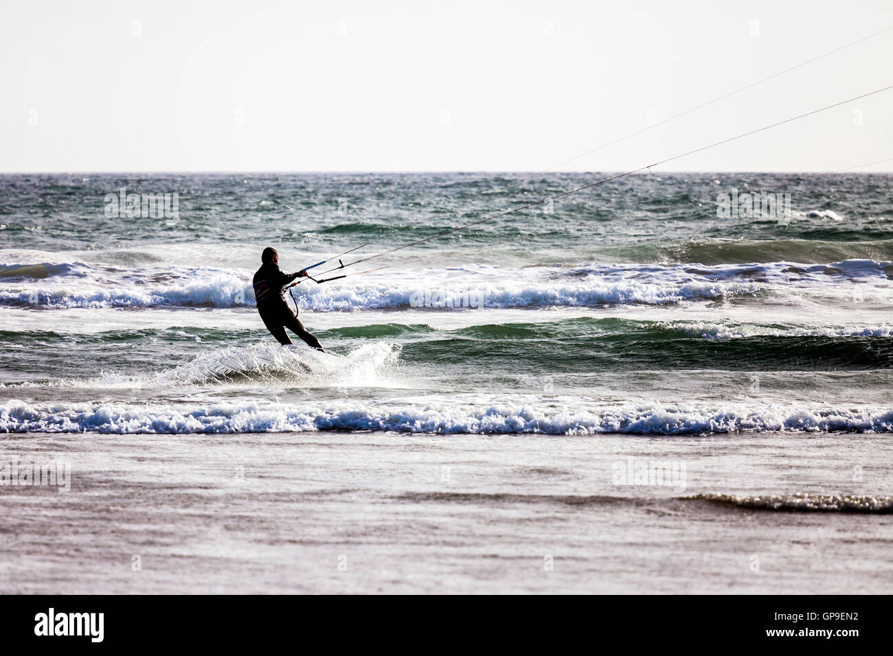 Newgale beach pembrokeshire surfer hi-res stock photography and images ...