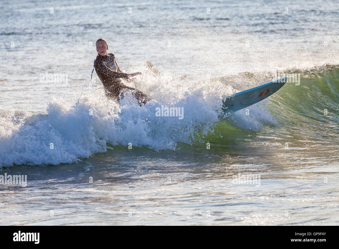 Surfer in West Wales, UK Stock Photo - Alamy