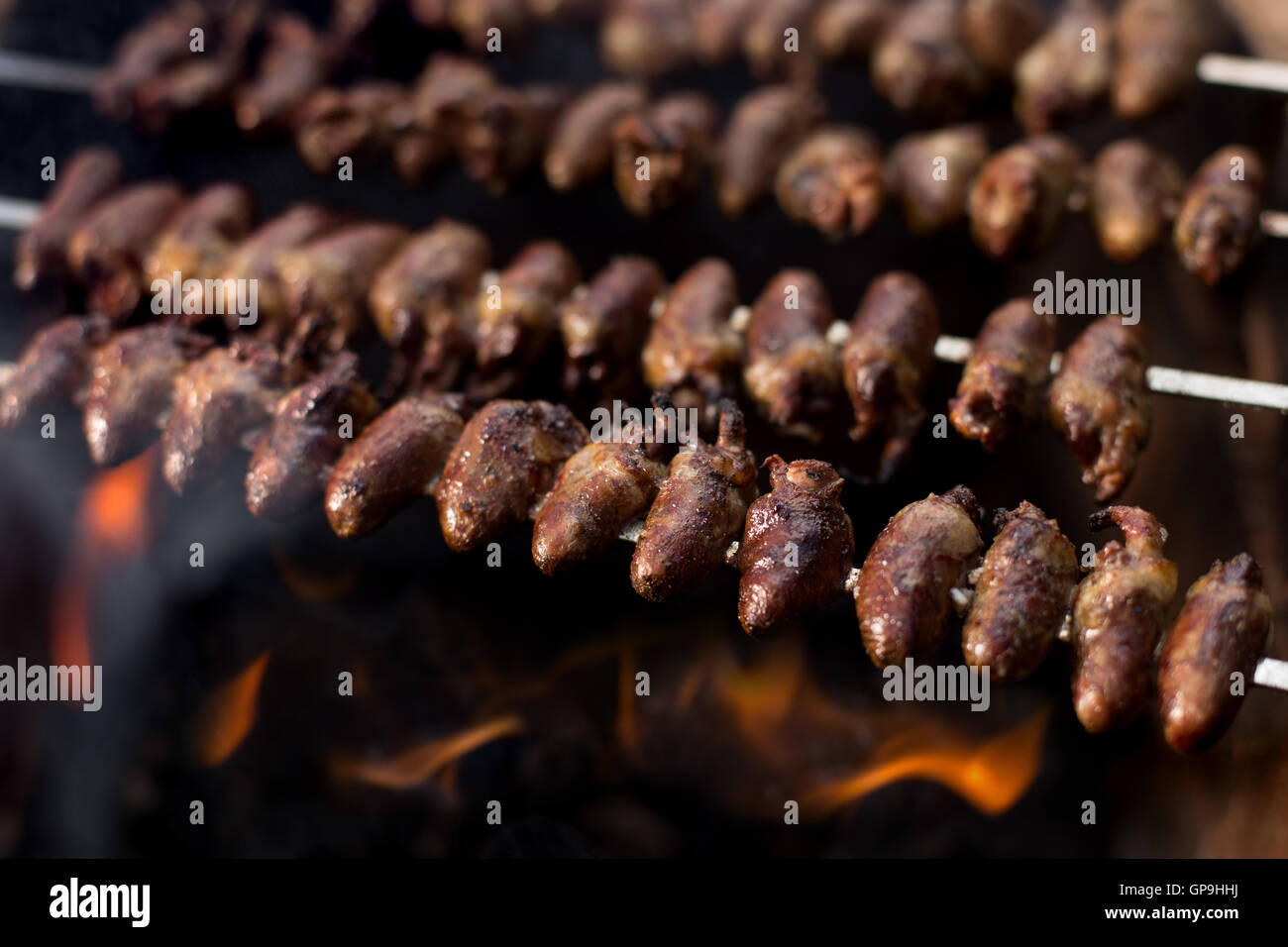 Churrasco, traditional Brazilian barbecue, chicken hearts grilled ...