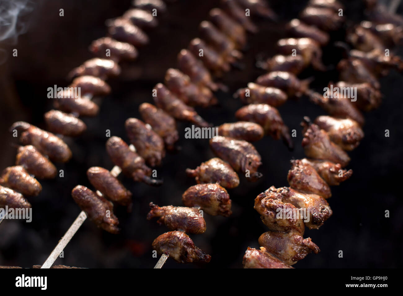Churrasco, traditional Brazilian barbecue, chicken hearts grilled ...