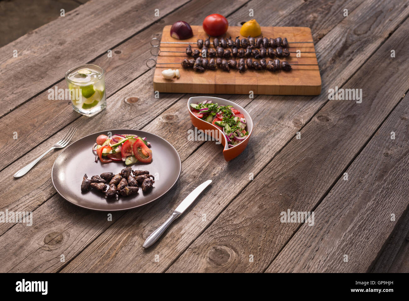 Churrasco, traditional Brazilian barbecue, chicken hearts grilled ...